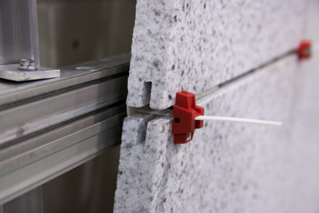 Facades Systems: Characteristics and Performance of Cast Stone Vs Natural Stone - Polycor Inc.