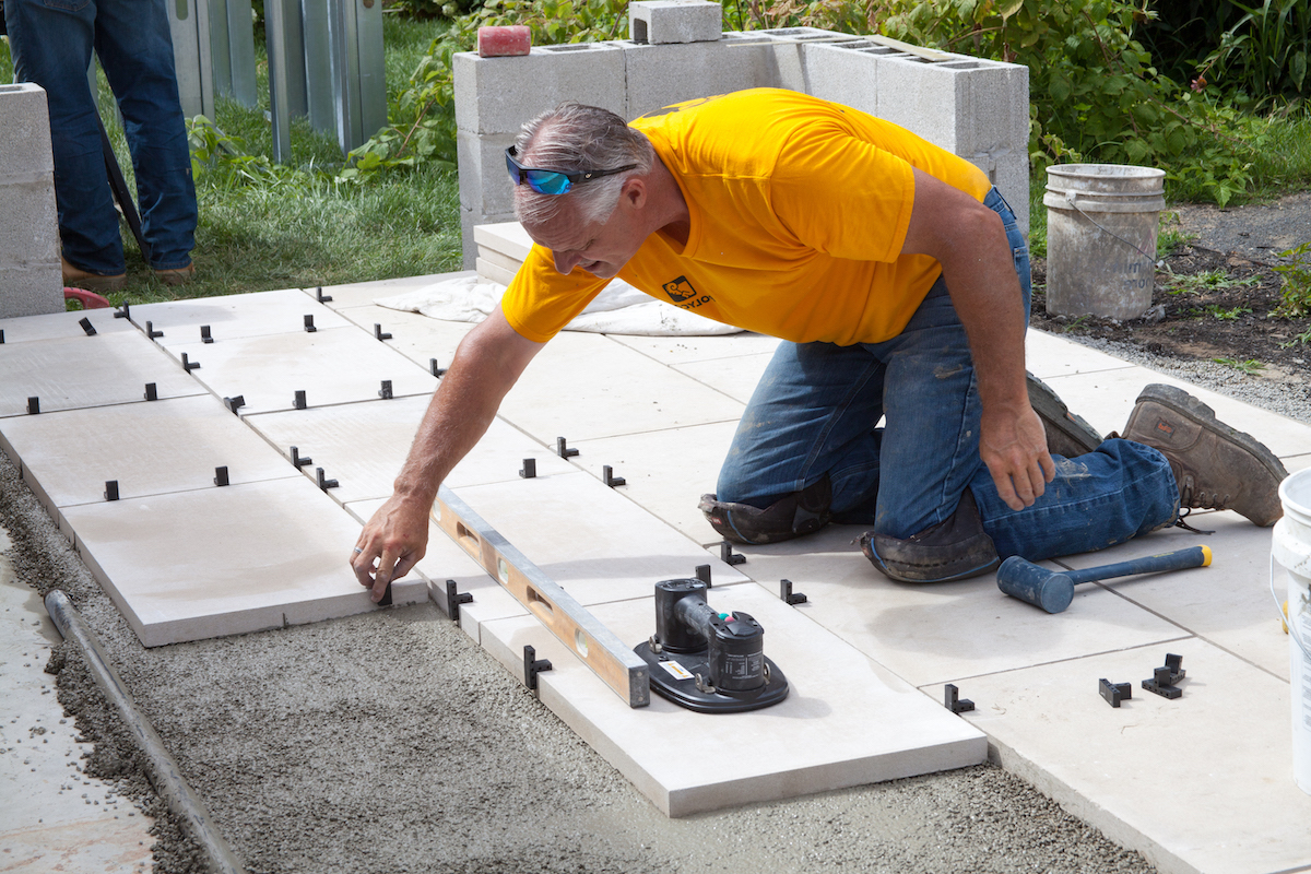 Installing Pavers on a Permeable Bonded Paving System - Polycor Inc.